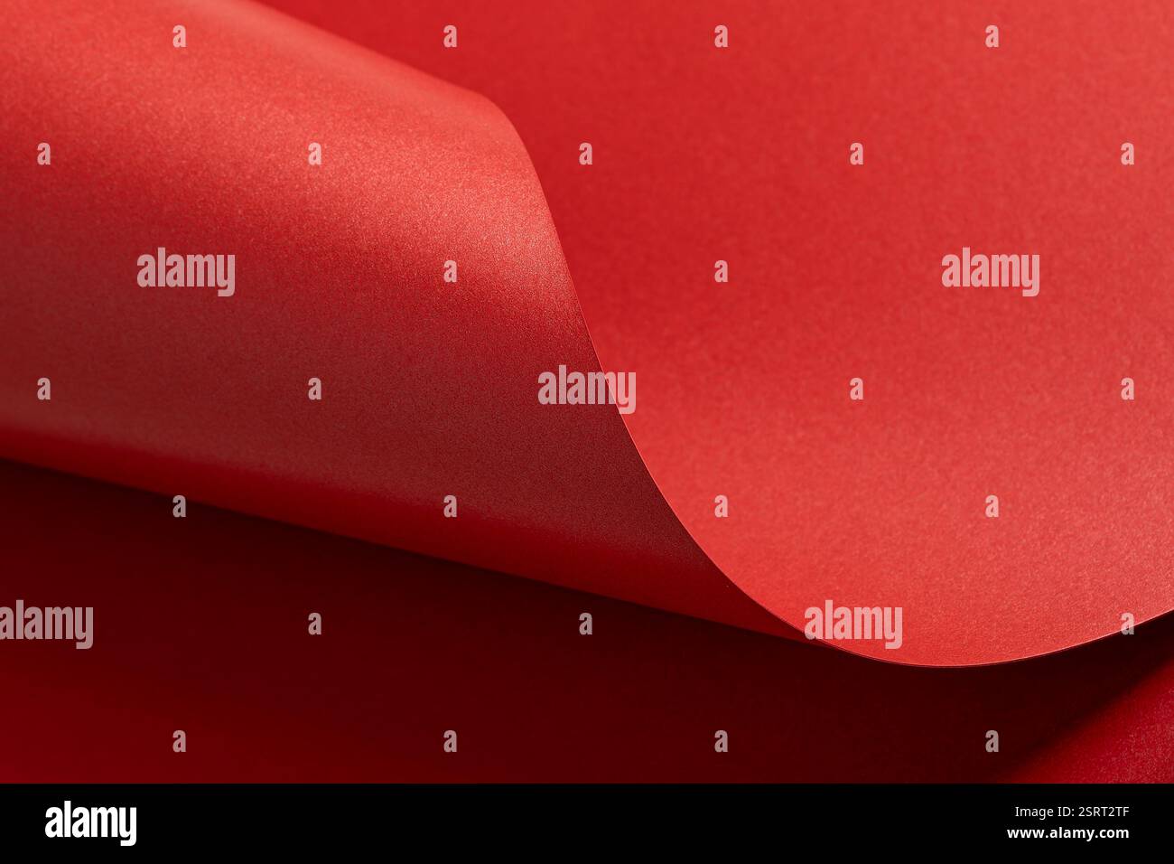 Fiery crimson paper background with a pearlescent, glossy texture and ...