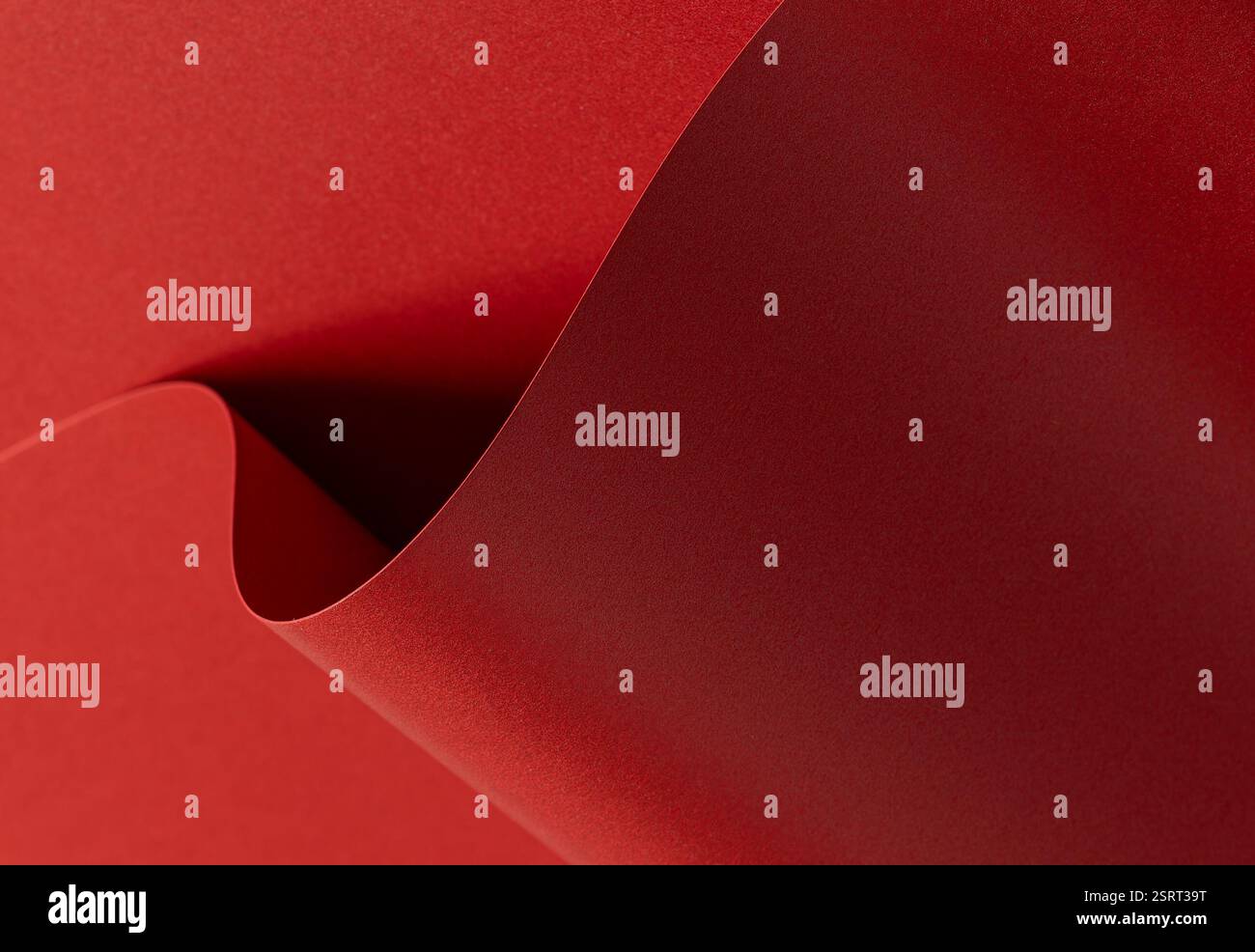 Fiery crimson paper background with a smooth texture and wavy edges ...