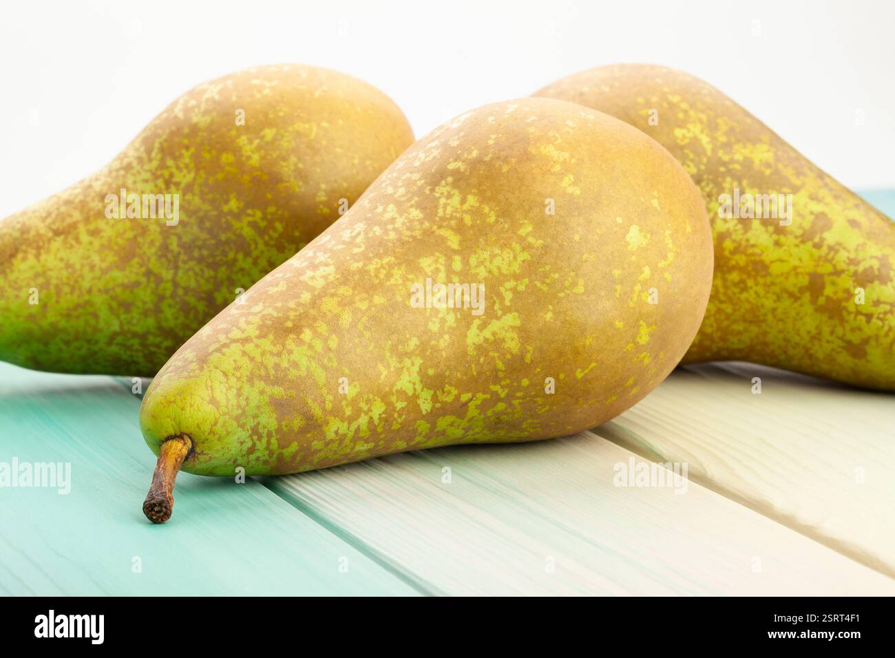 pear group on wood background Stock Photo - Alamy