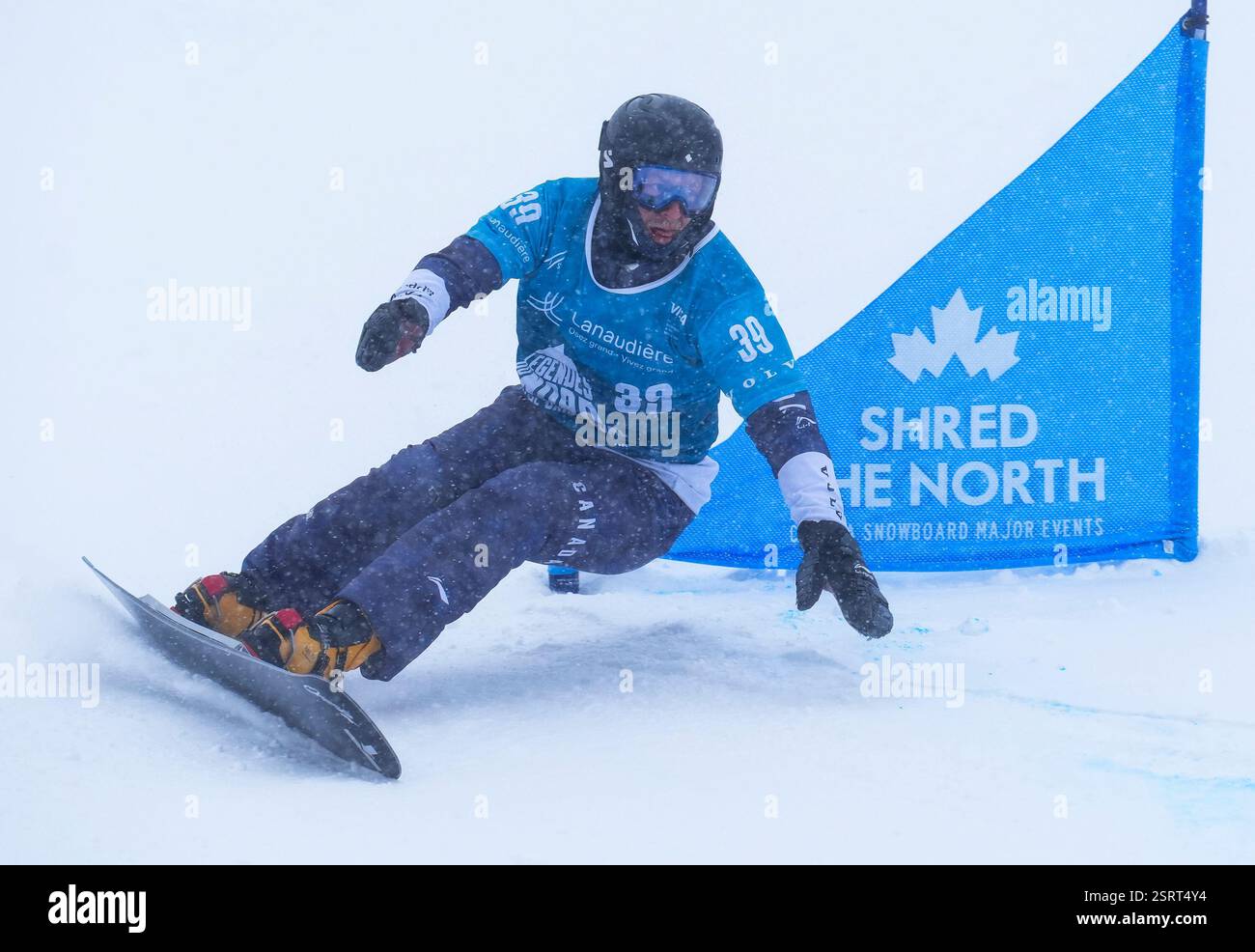 Canada's Ben Heldman races in the qualifications of the men's parallel ...