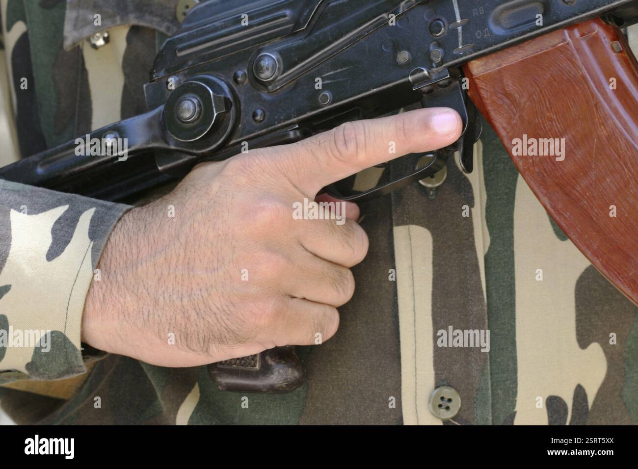 Black Cat commando with an AK 47 light machine gun MR#725 Stock Photo ...