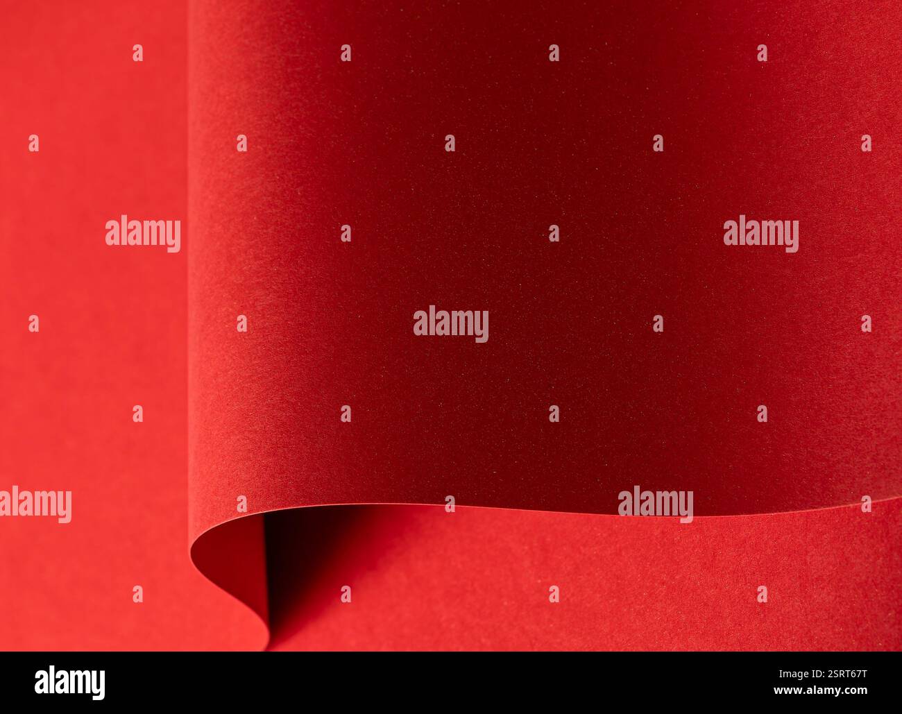 Fiery crimson paper background with a velvety smooth texture and wavy ...