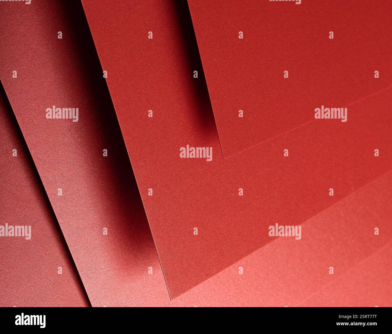 Fiery crimson paper background with deep garnet and mahogany tones ...
