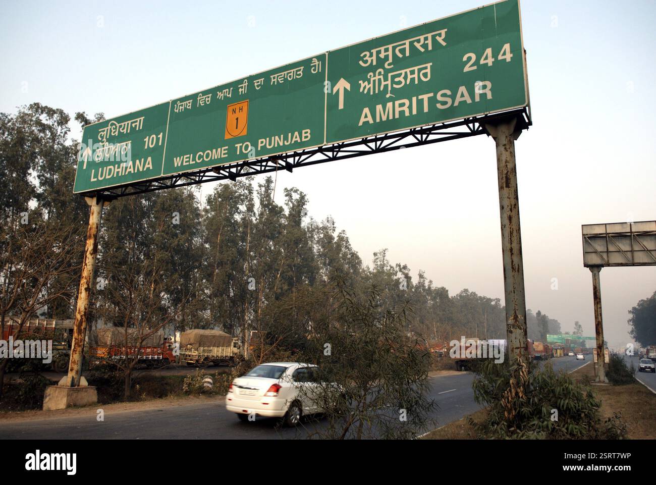 Welcome signboard of Punjab on highway showing direction towards ...
