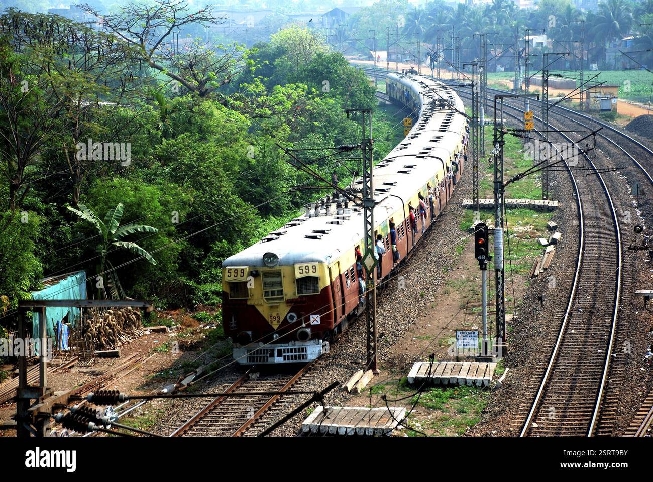 E.M.U suburban local train on track, Calcutta Kolkata, West Bengal ...