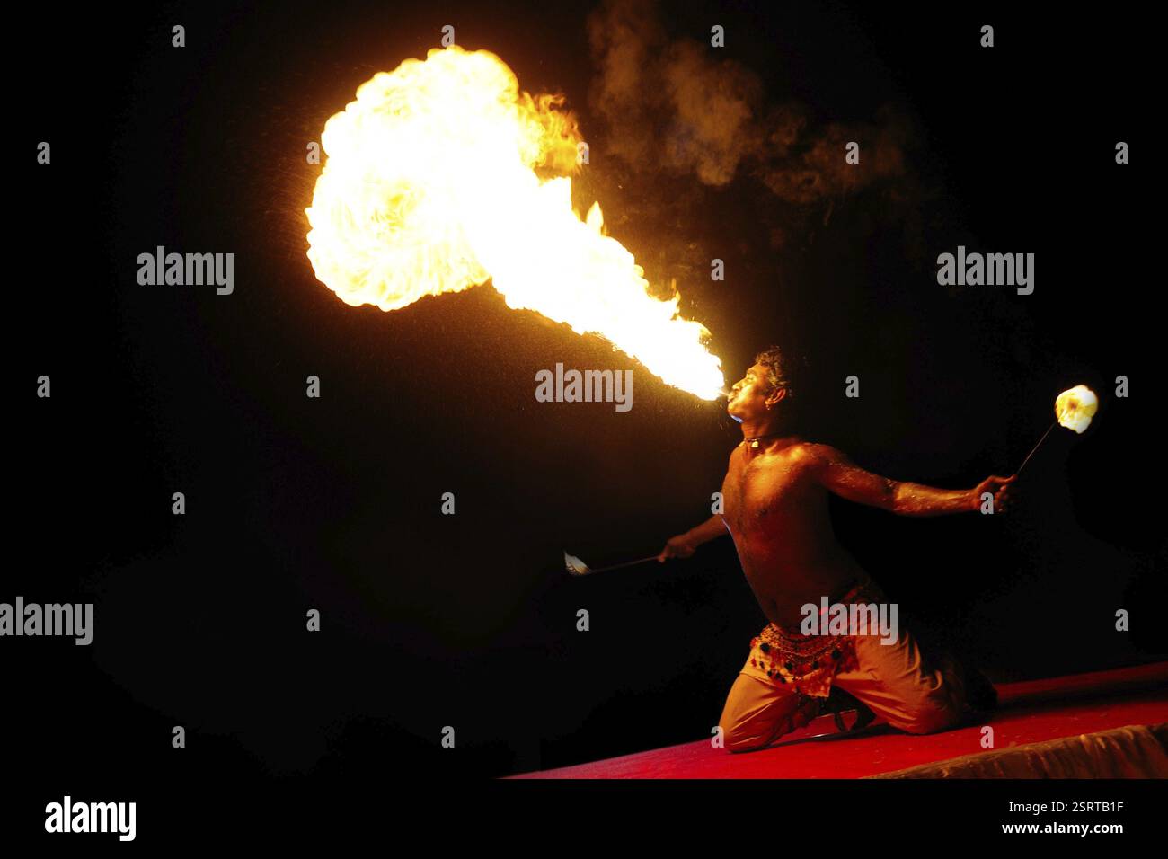 Man emitting fire from his mouth, Jodhpur, Rajasthan, India MR#786T ...