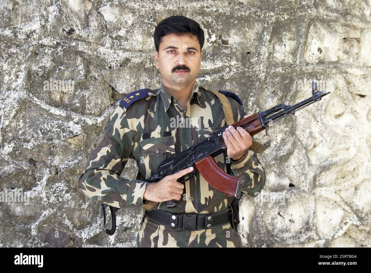 Black Cat commando with an AK 47 light machine gun MR#725 Stock Photo ...