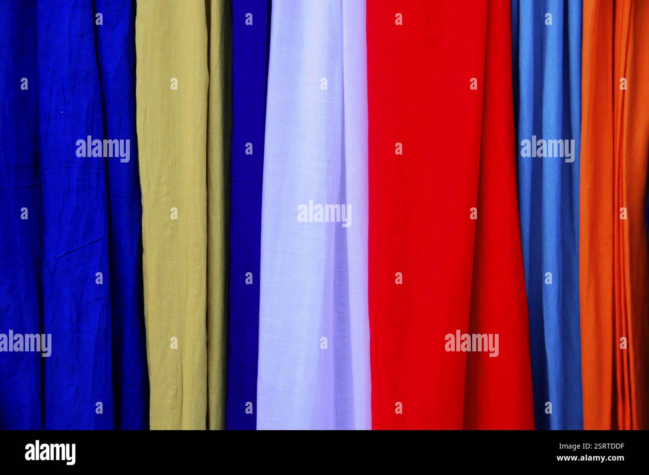 Colourful fabric panels arranged in vertical lines, bright colours such ...