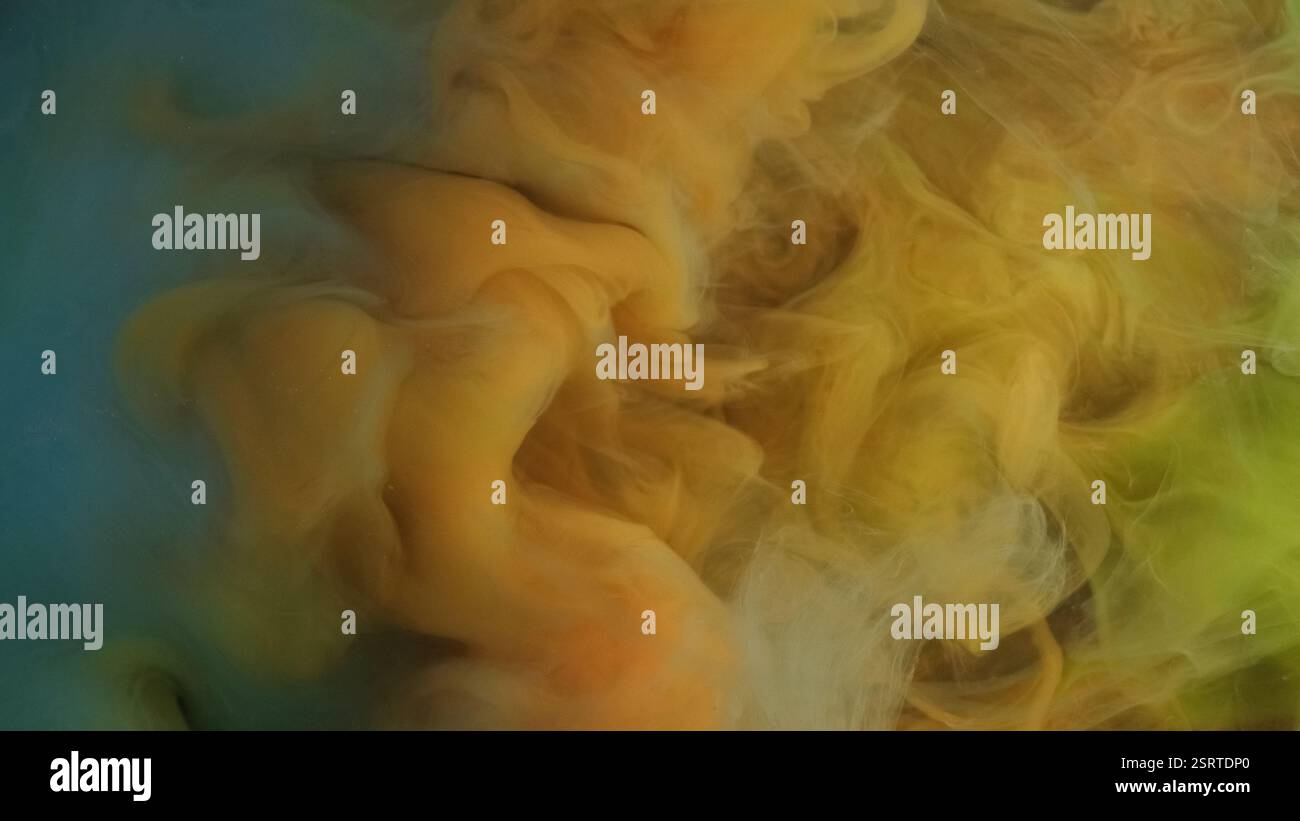 Smoke flow. Haze paint. Orange yellow green soft fume water swirl ...