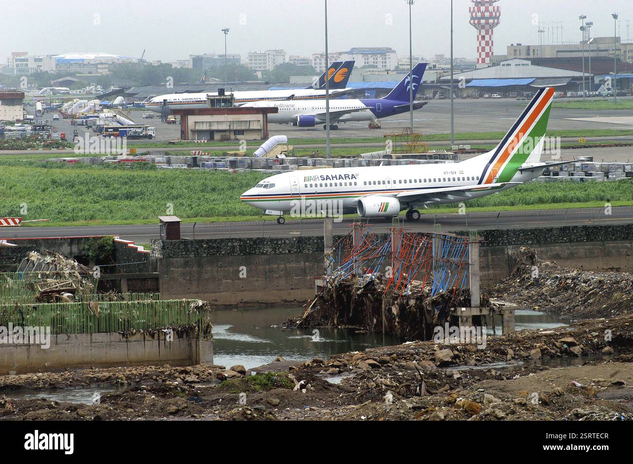 Commercial plane on runway ready for take off at Sahar airport or ...