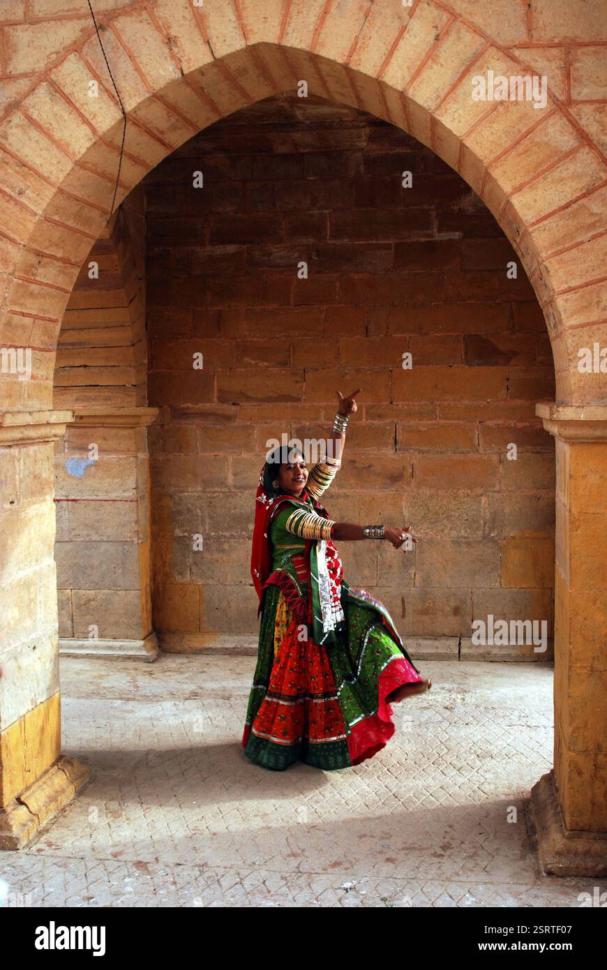 Folk dancer dancing in porch of Gadisar Gadsisar lake, Jaisalmer ...