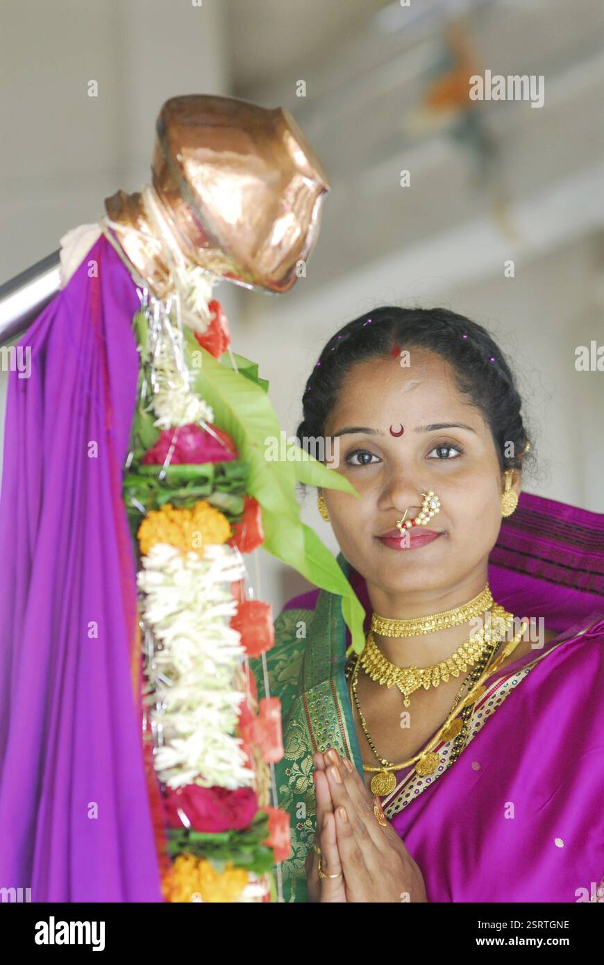 Hindu lady praying in front of gudi celebrating gudi padva, Bombay ...