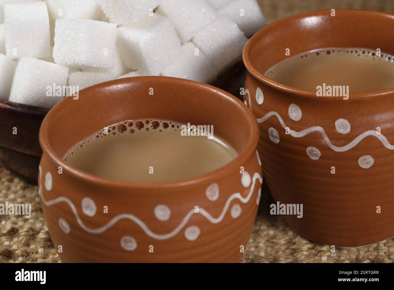 Cup of Indian Kulhad tea with sugar cubes, India, Asia Stock Photo - Alamy
