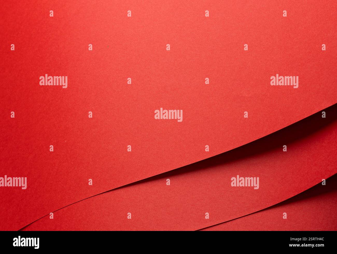 Fiery vermilion red paper background with a smooth texture and ...
