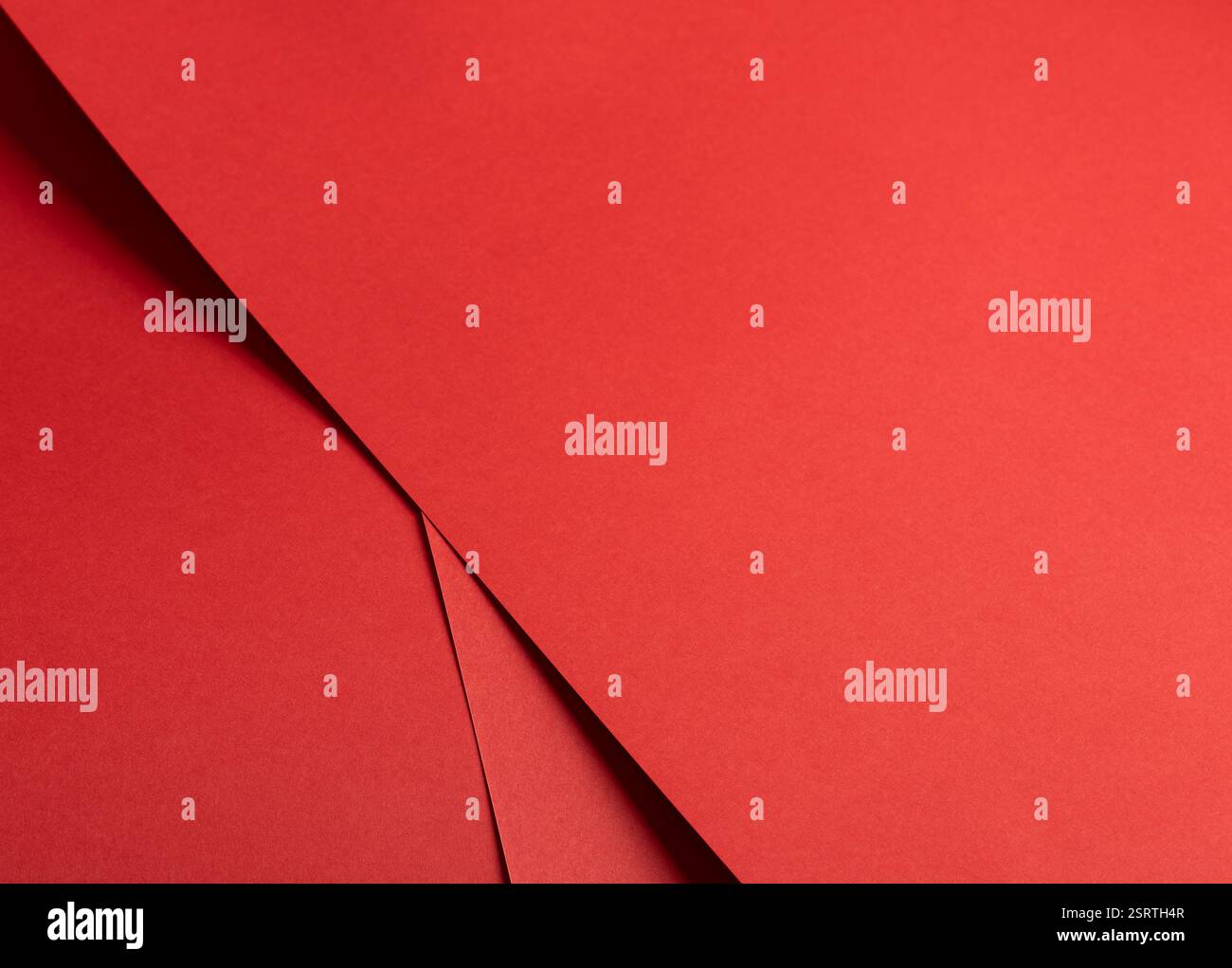 Fiery vermilion red paper background with a smooth texture and ...