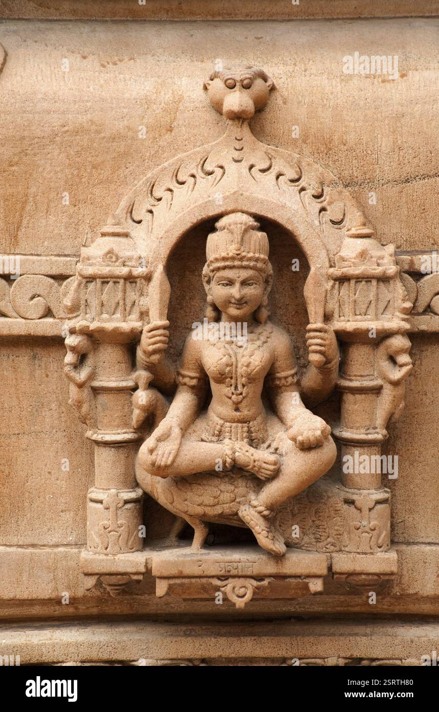 Sculpture of goddess sitting on peacock on the wall of panchasara ...