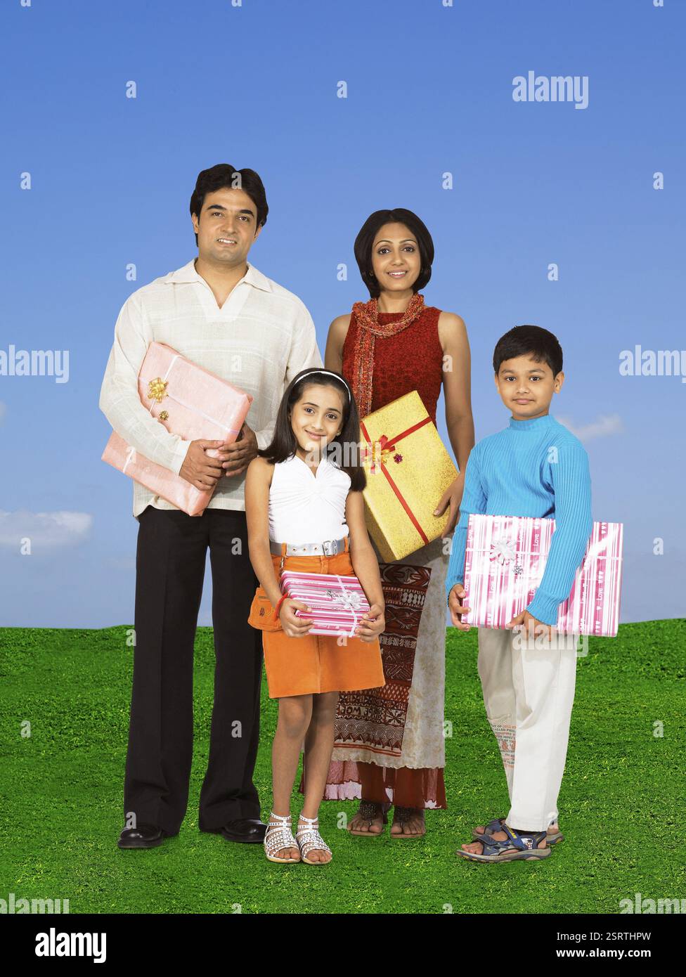 Three children stands hi-res stock photography and images - Alamy