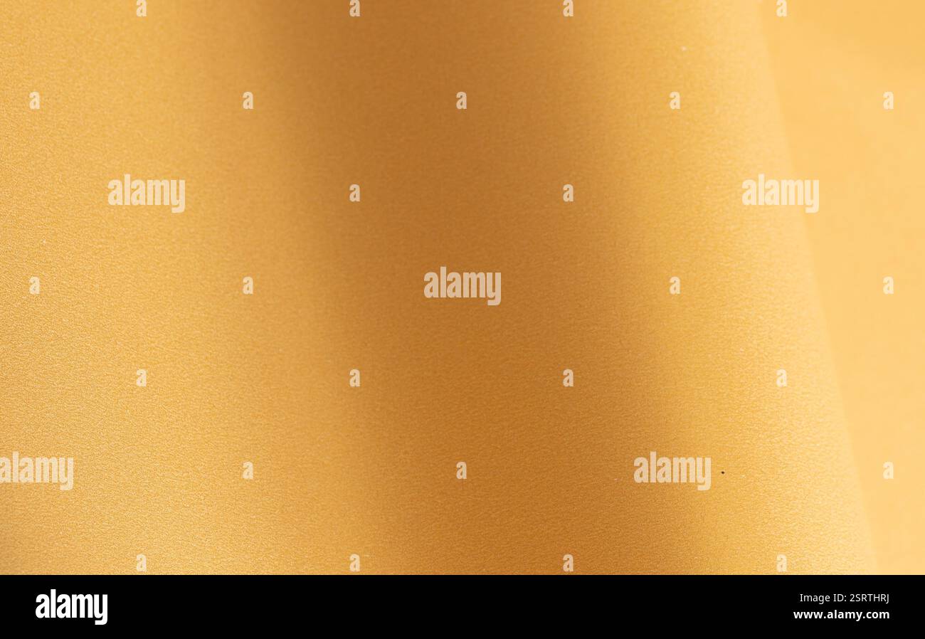 Golden yellow paper background with a smooth texture and soft gradient ...