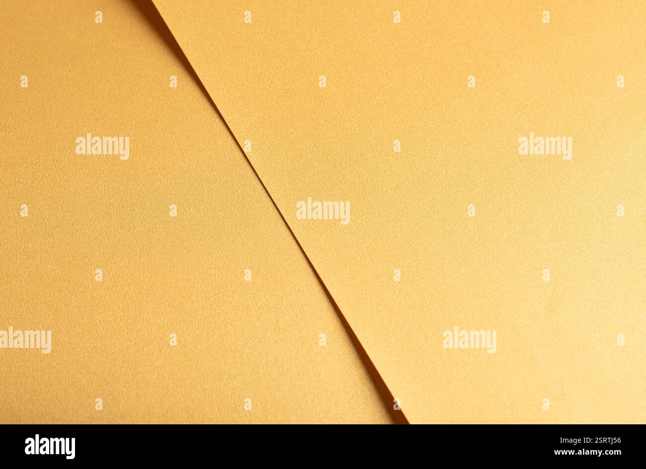 Golden yellow paper background with a smooth texture and soft gradient ...