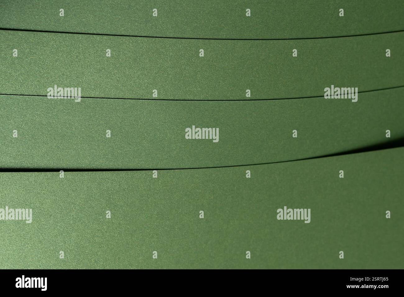 Moss green paper background with a smooth matte texture and subtle ...