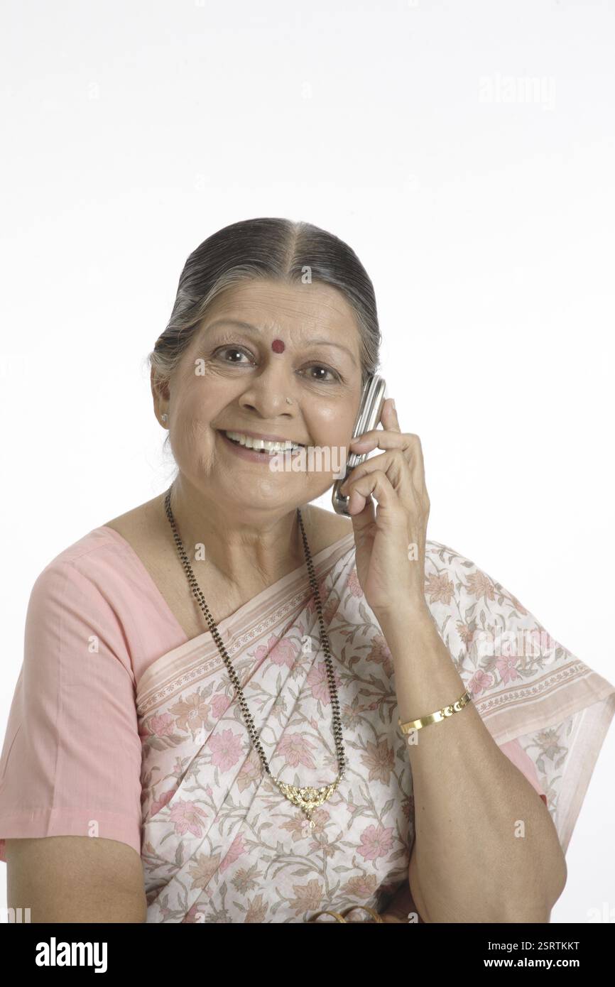 Old woman smiling talks on hi-res stock photography and images - Alamy