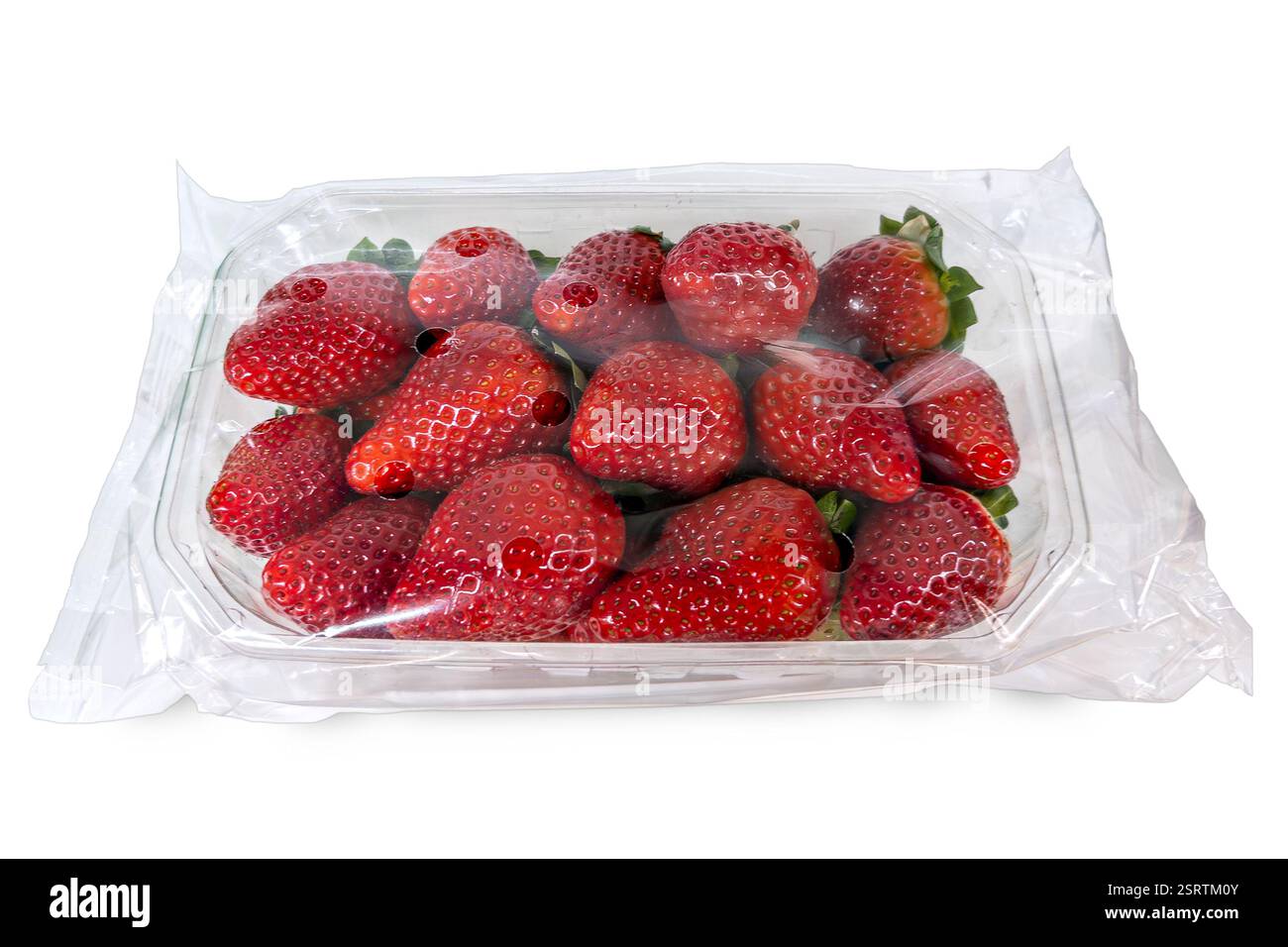Red ripe strawberries in clear plastic package for supermarket sale ...