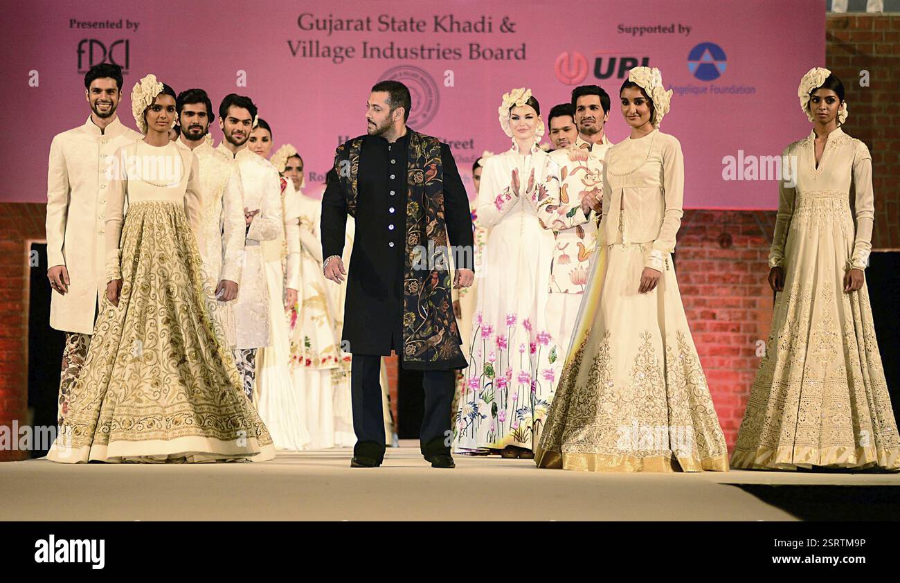 Bollywood actor Salman Khan walks on ramp during a fashion show to ...