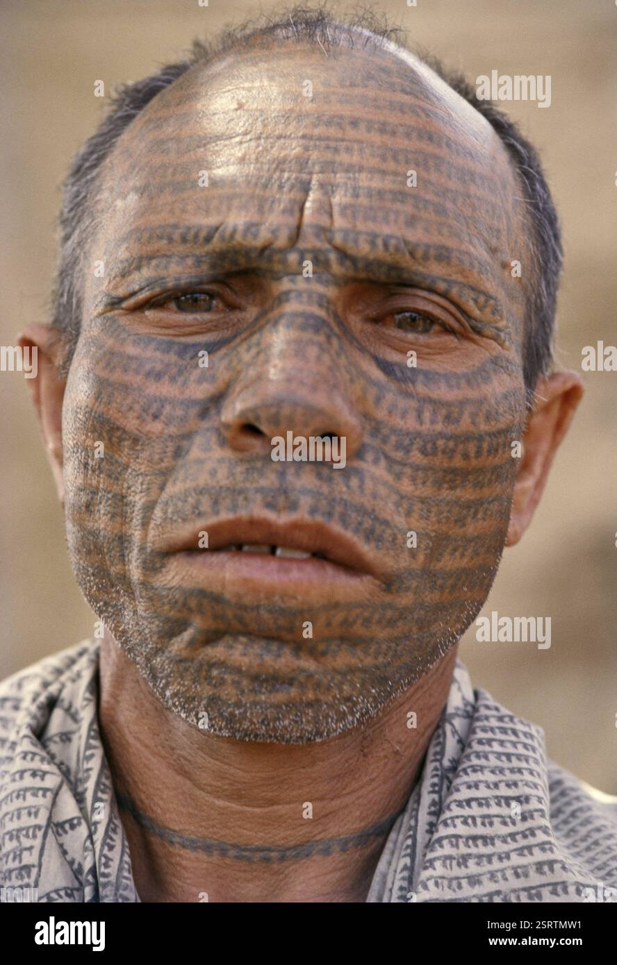 The tattooed face of a Ramnaami ascetic with the reputed pattern of ...