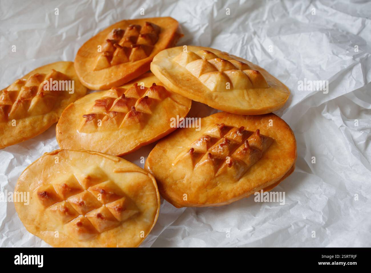 Polish smoked cheese cooked on grill on white background Stock Photo ...