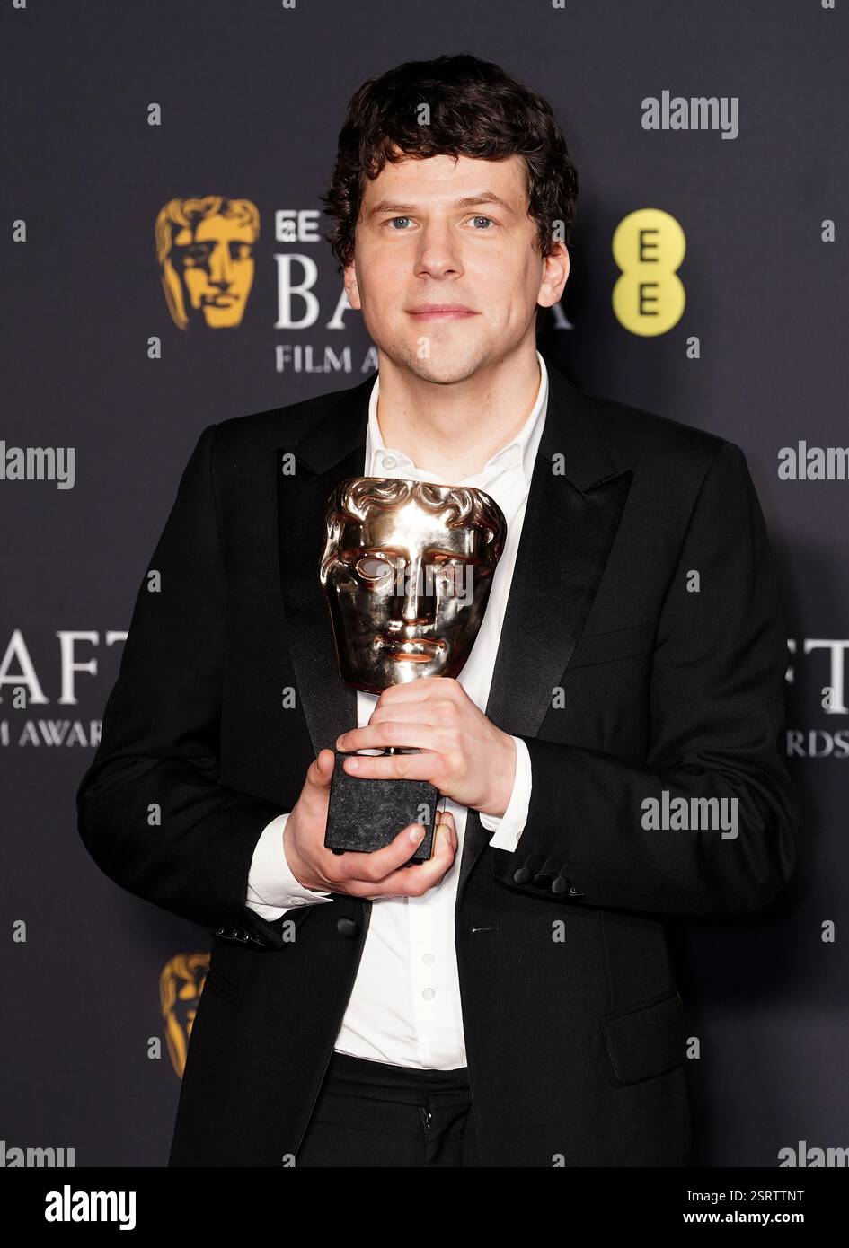 Jesse Eisenberg in the press room after winning the Best Original ...