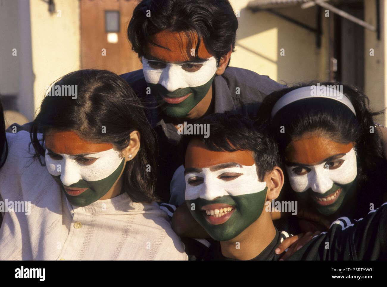 Face Painting Tri colors colours Stock Photo - Alamy