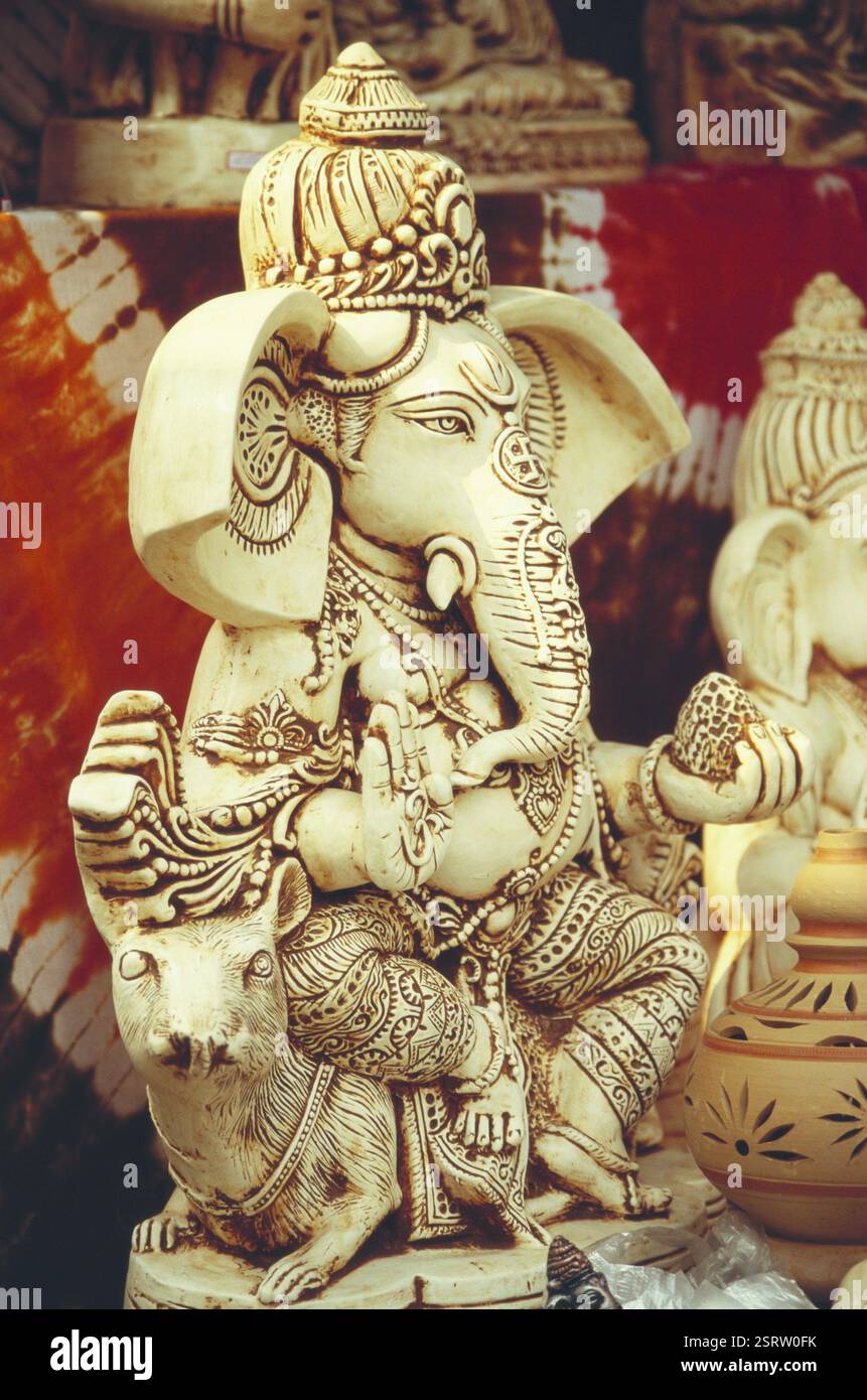 Ganesh ganpati idol of elephant headed god mounted on mouse in ...