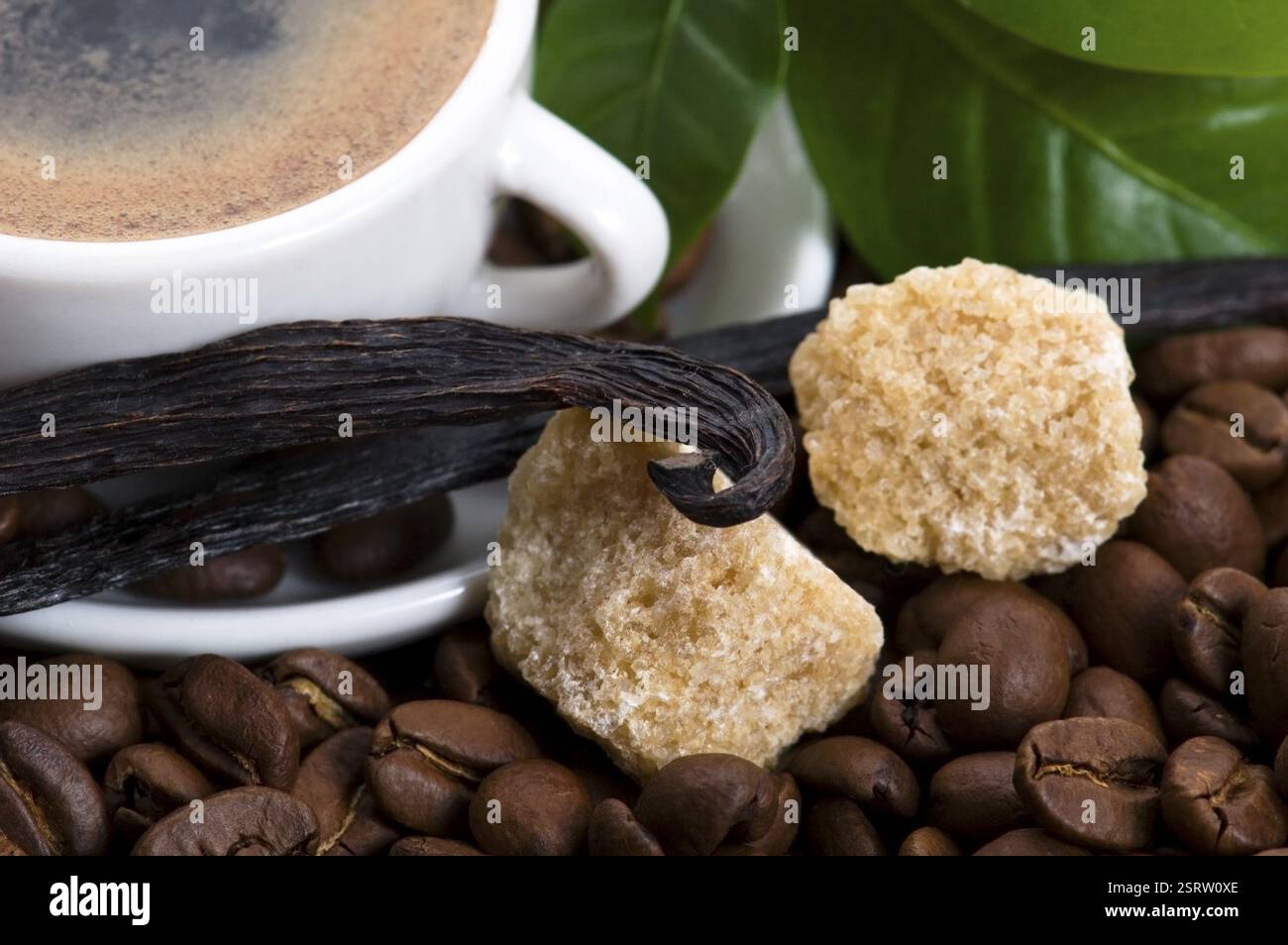 Aroma coffee with vanilla and coffee branch Stock Photo - Alamy