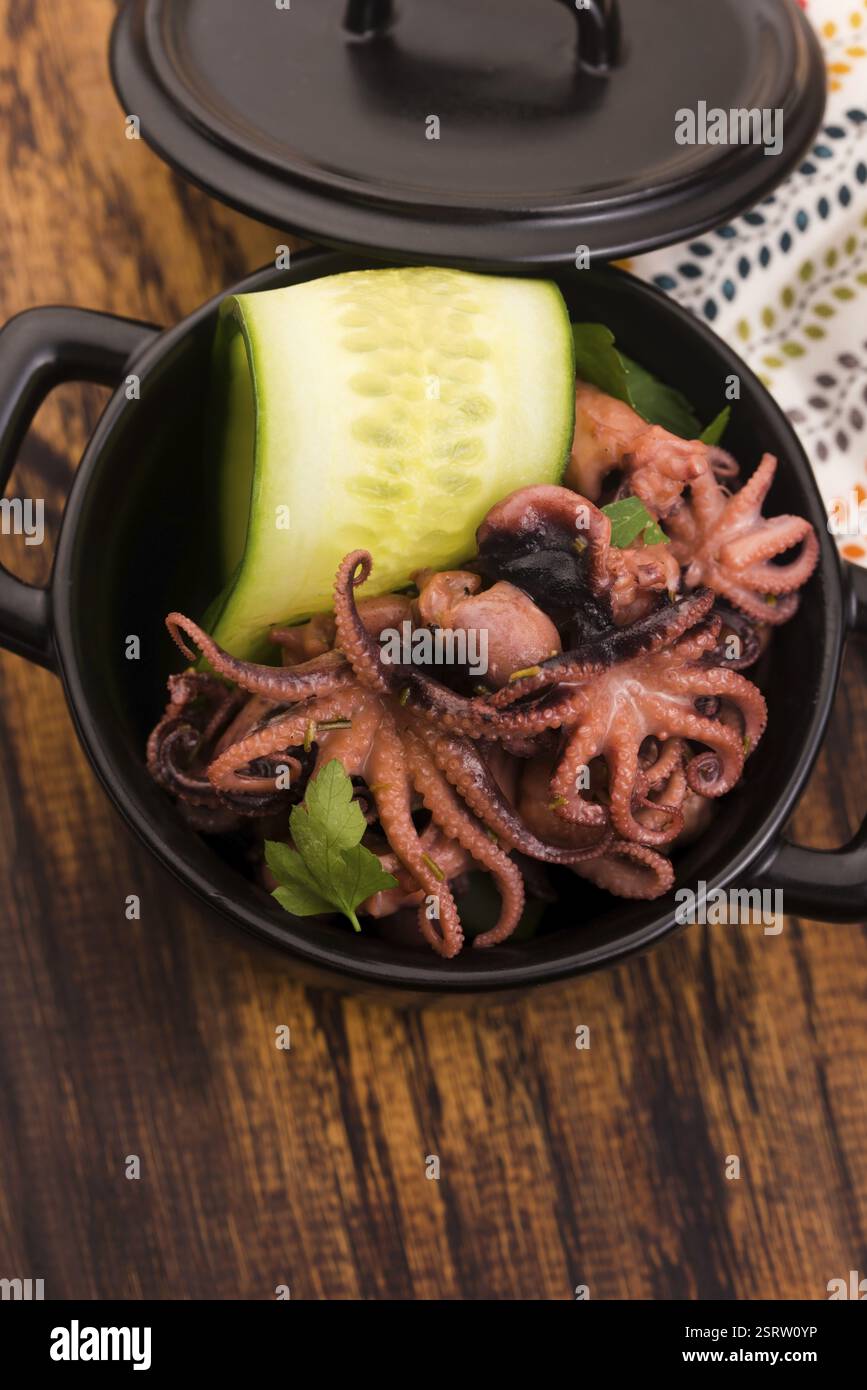 Octopus. Greek, eating Stock Photo - Alamy
