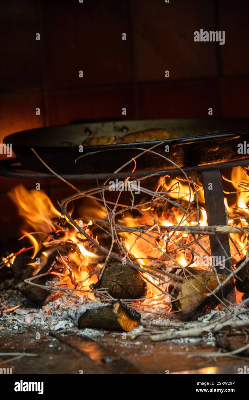 Wood fired paella hi-res stock photography and images - Alamy