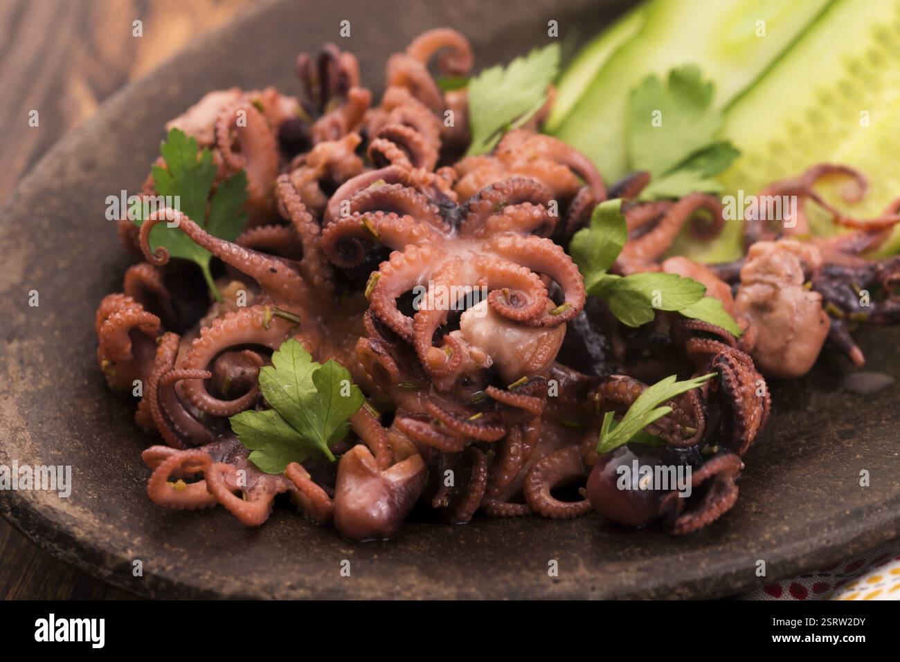 Octopus. Greek, eating Stock Photo - Alamy