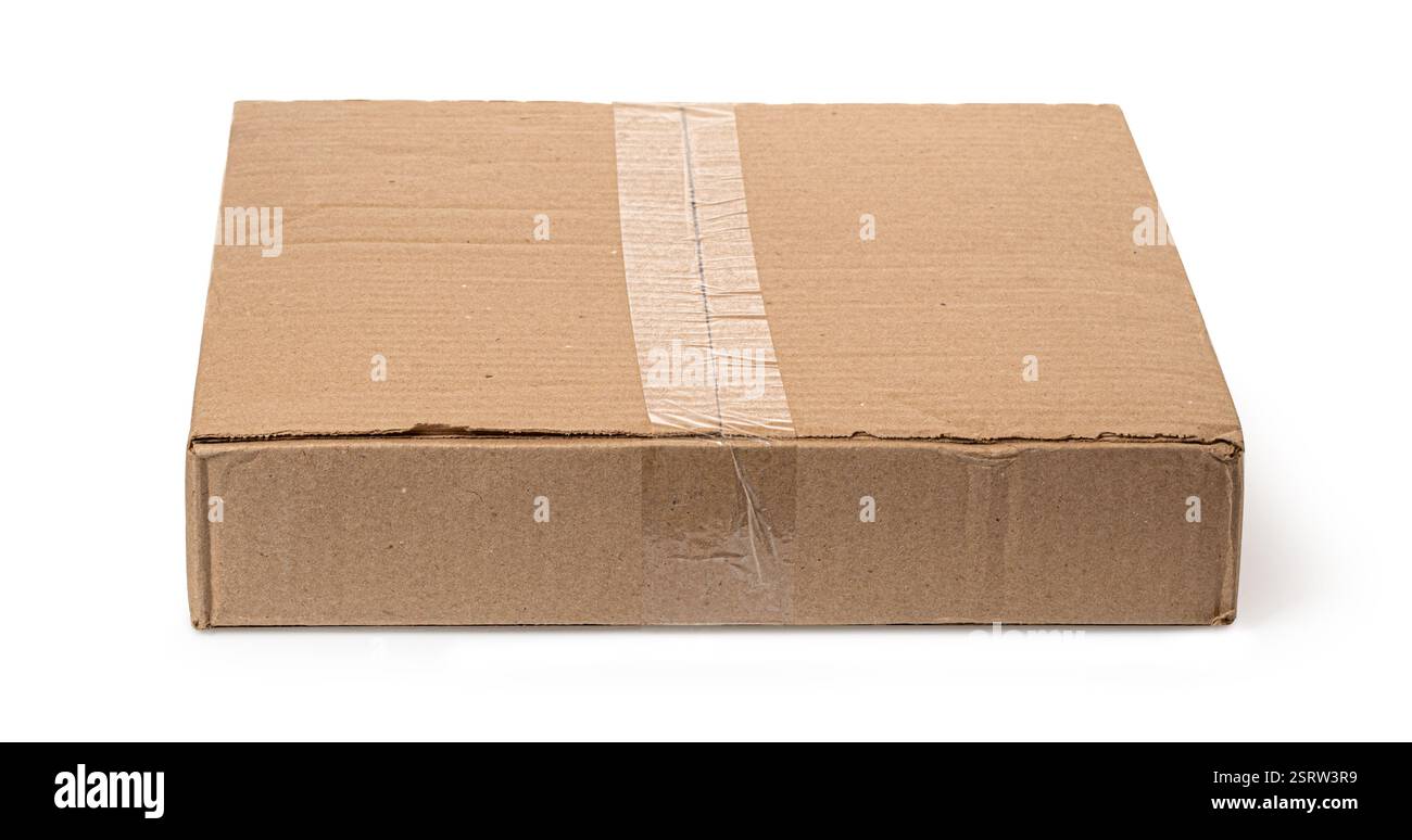 Single closed cardboard box sealed with adhesive tape, isolated on ...