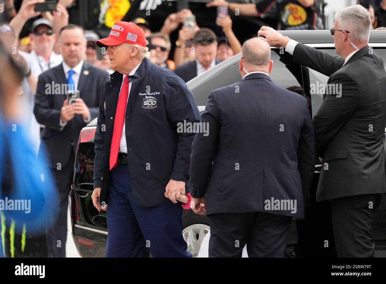 President Donald Trump arrives at the NASCAR Daytona 500 auto race at ...