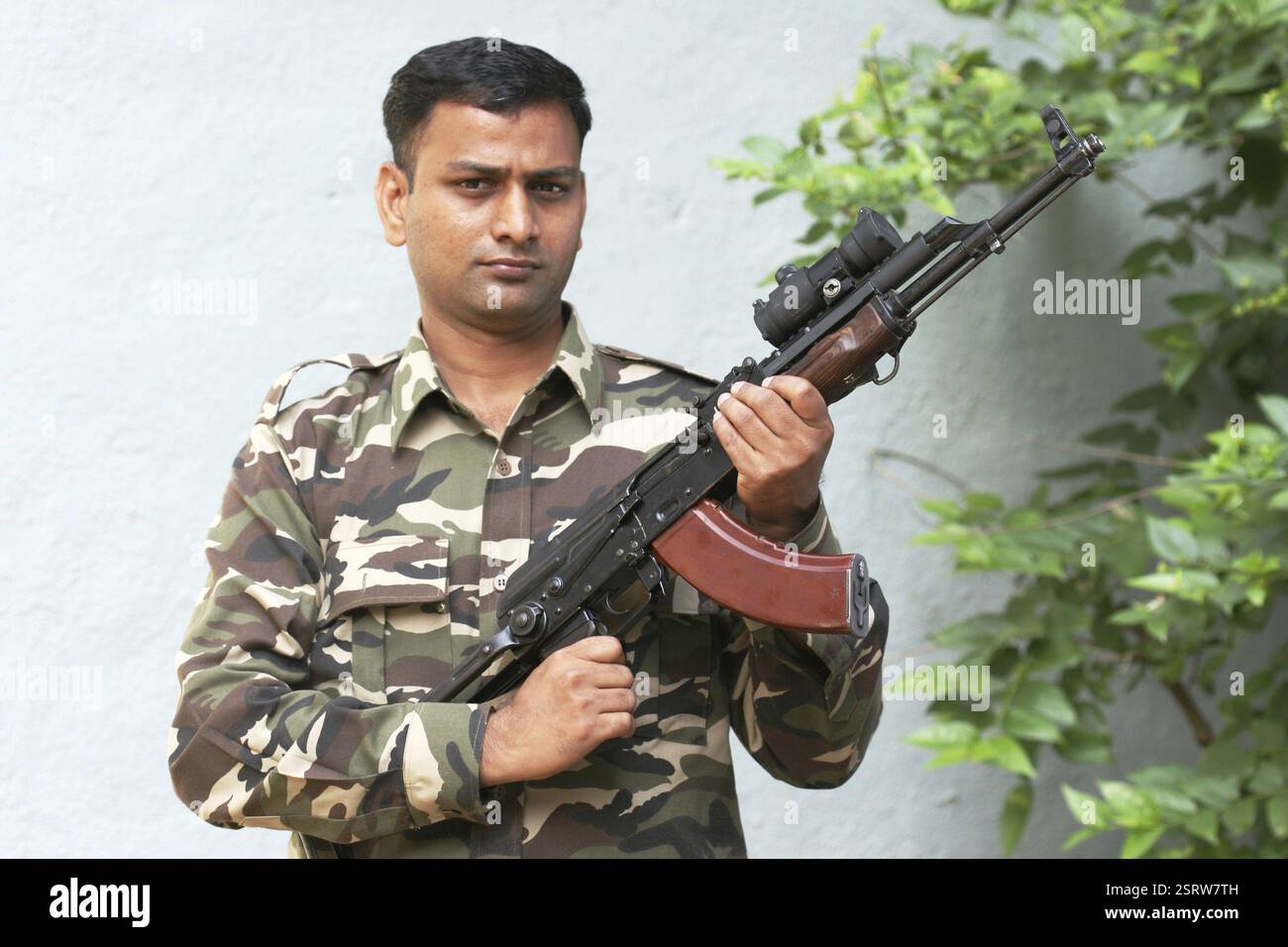 Black Cat commando with an AK 47 light machine gun MR#725 Stock Photo ...