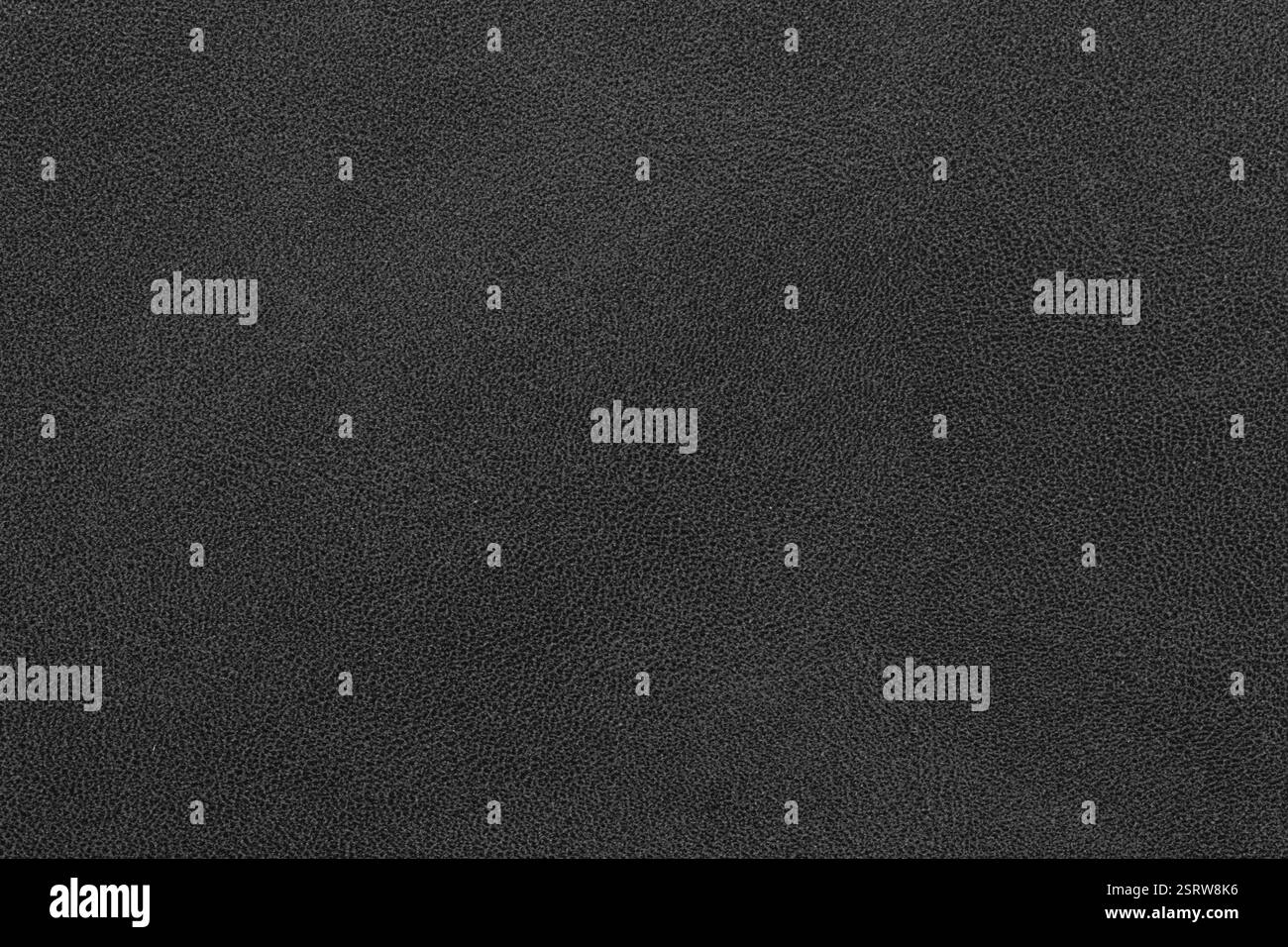 Close-up view of dark gray leather texture, creating a luxurious and elegant background Stock ...