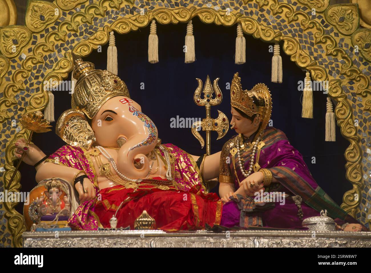 Idol of Ganesha with Sharada in sitting pose in pandal, pune ...