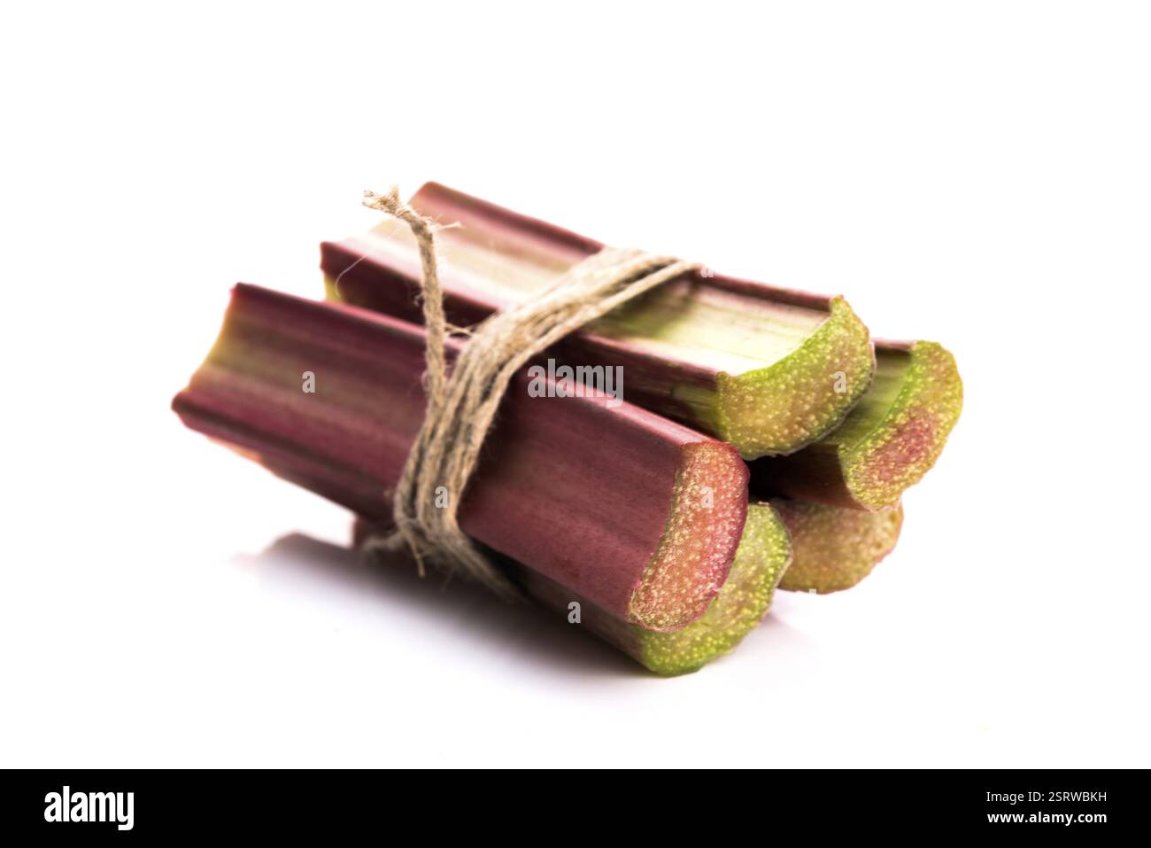 Bunch of fresh rhubarb isolated on white background Stock Photo - Alamy