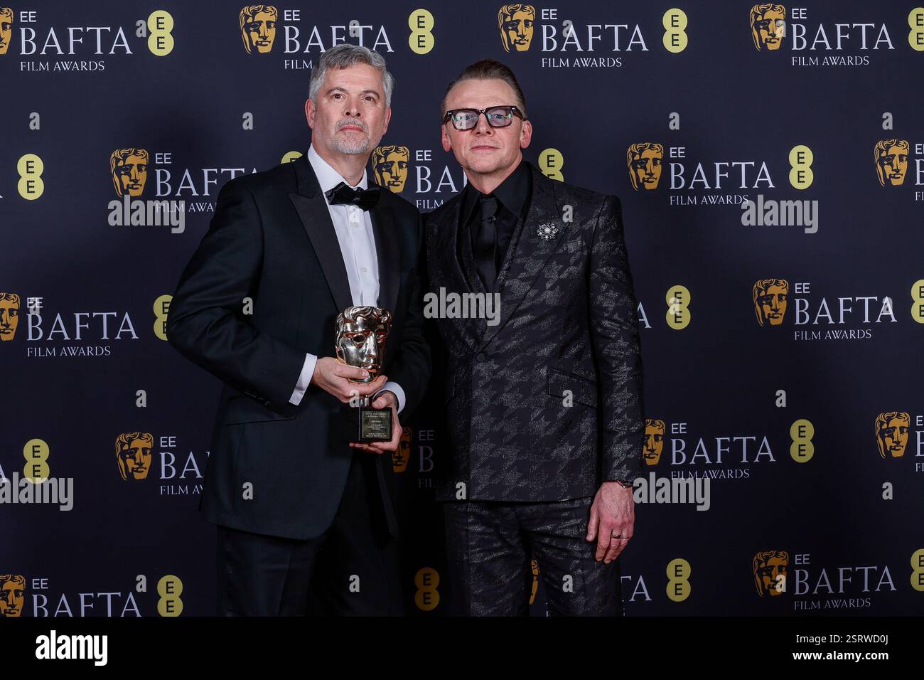 CEO of MediCinema, Colin Lawrence, left, poses with the outstanding ...