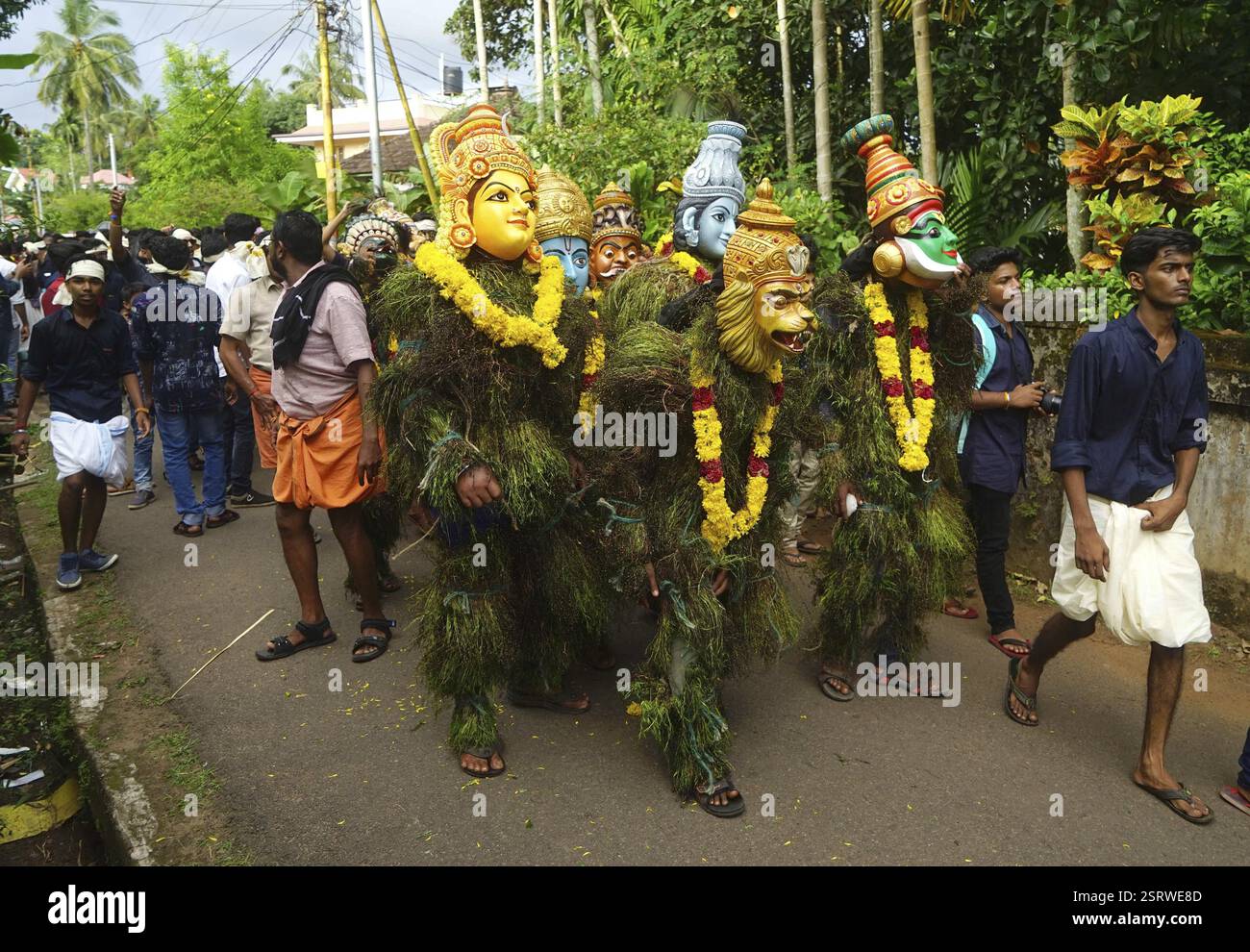 Traditional Kummatti dancers wear colourful wooden masks various Indian ...