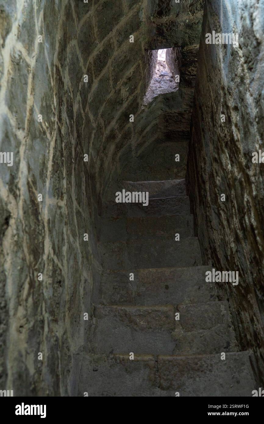 Stone Hallway: Guiding Light Through the Concrete Stairs Stock Photo ...