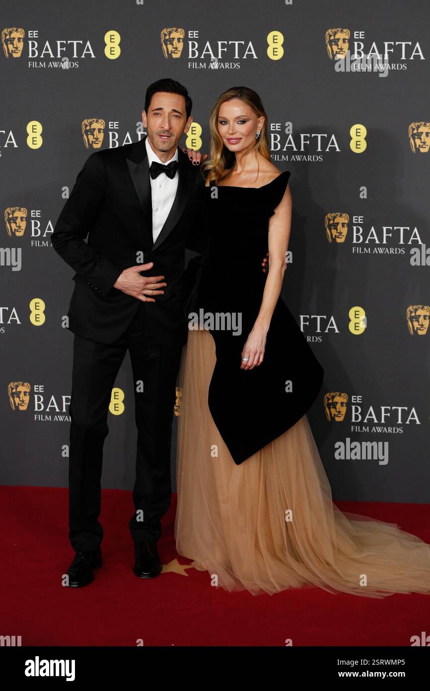 London, USA. 16th Feb, 2025. Adrien Brody and Georgina Chapman attend ...