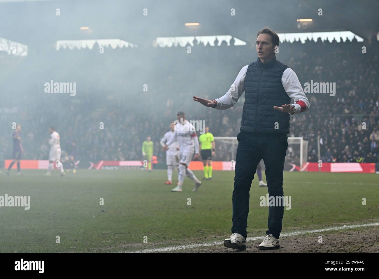 Antwerpen, Belgium. 12th Jan, 2025. Head Coach Jonas De Roeck of Antwerp reacts towards the fans ...