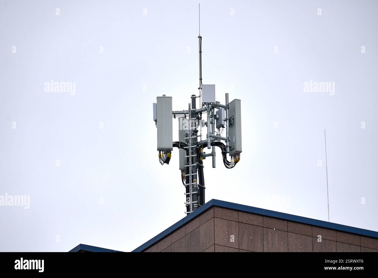 Munich, Bavaria, Germany - February 16, 2025: Mobile phone mast with ...