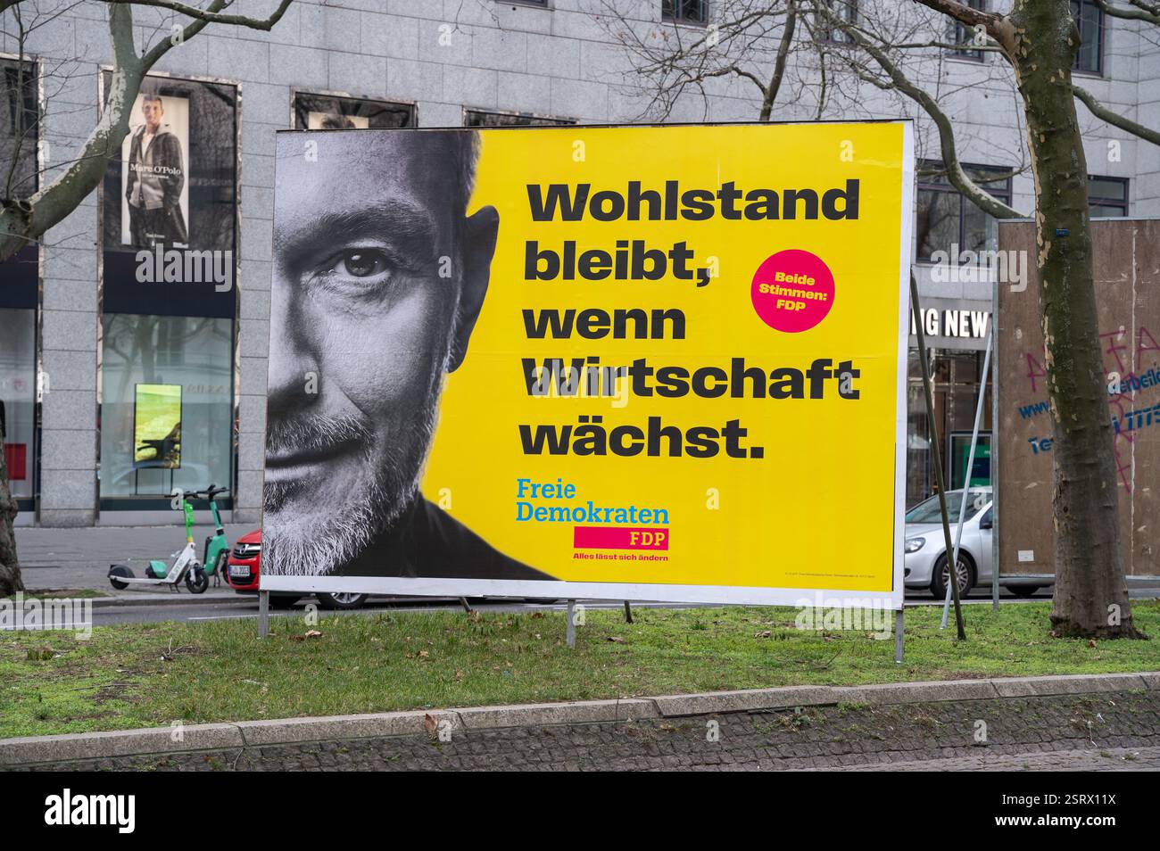 10.02.2025, Berlin, Germany, Europe - Billboard with defaced election ...