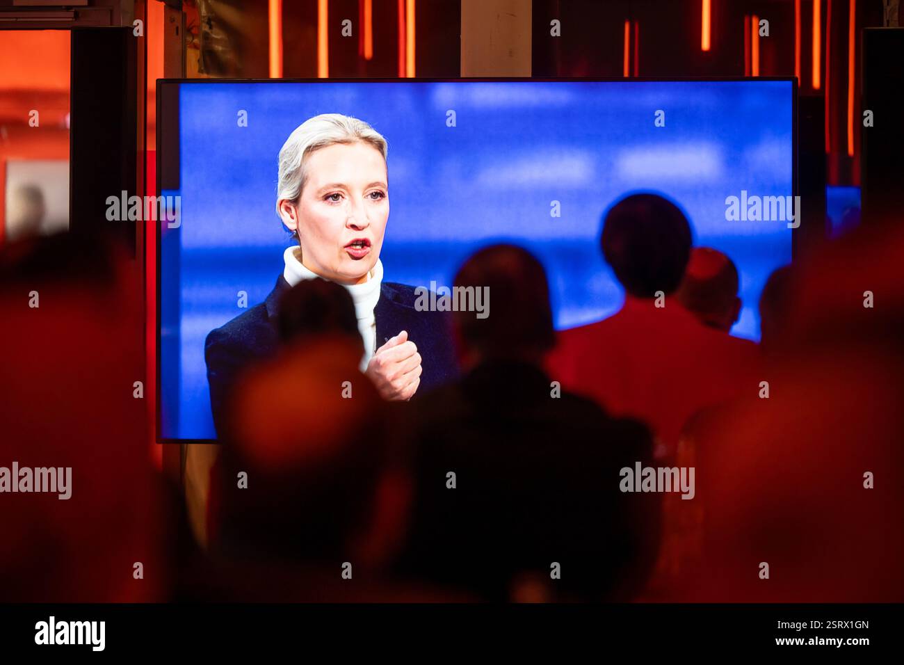 16 February 2025, Berlin: Observers follow the "Quadrell", the TV round ...